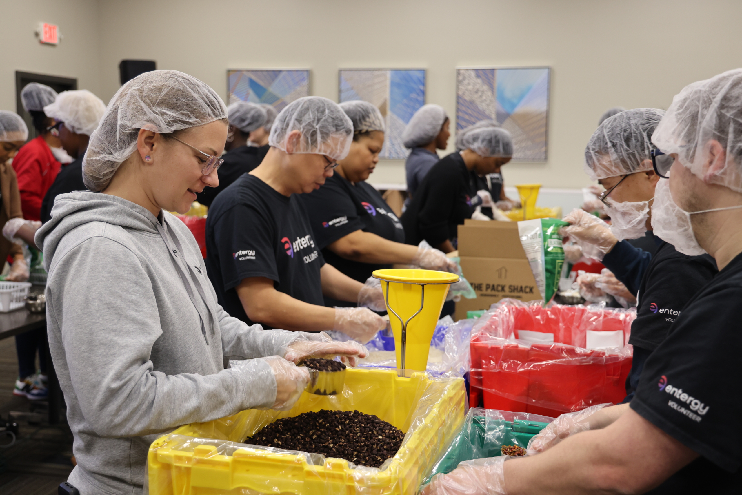 Entergy volunteers pack more than 20,000 meals to fight hunger in ...