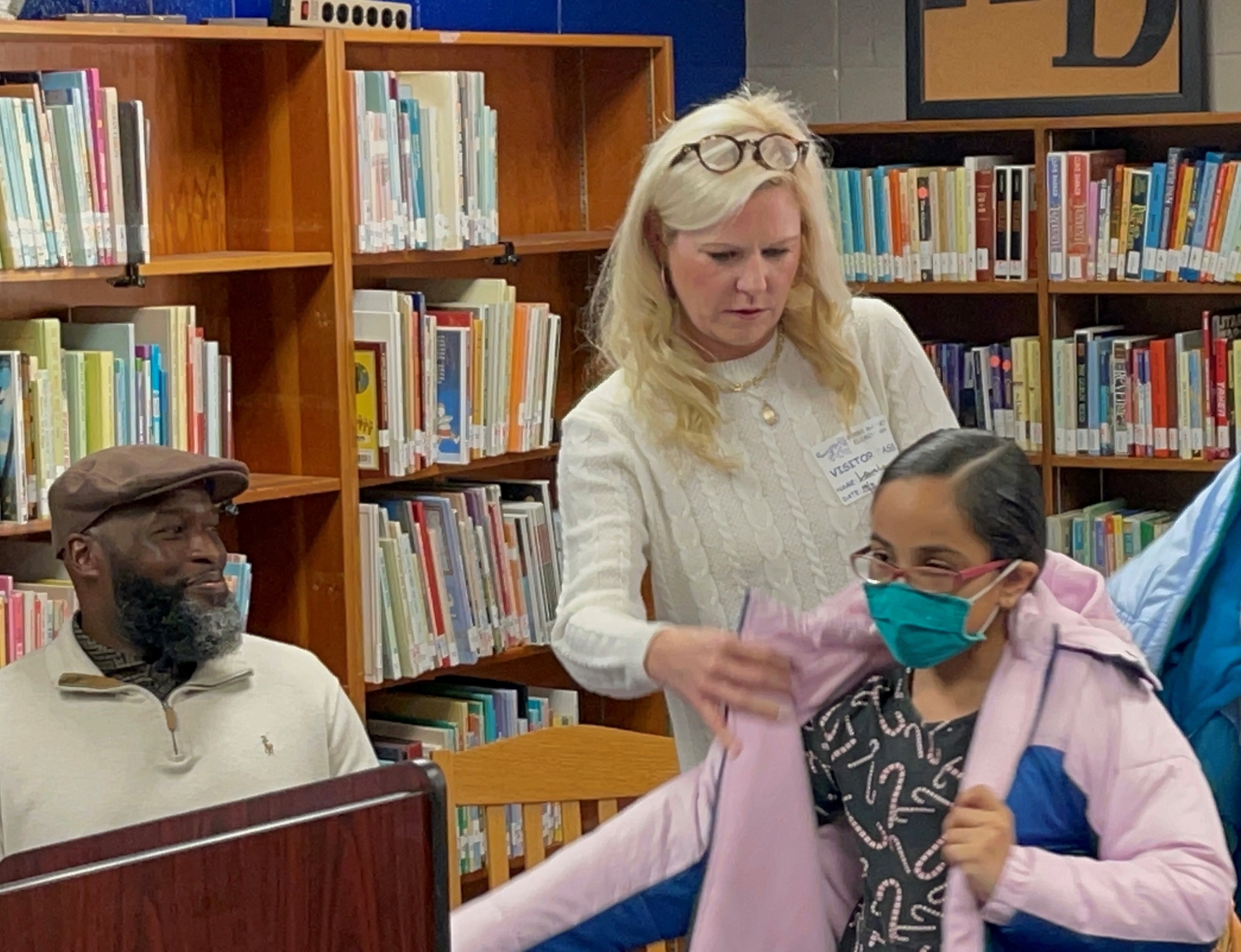 Entergy Arkansas, Little Rock firefighters distribute coats in LRSD ...